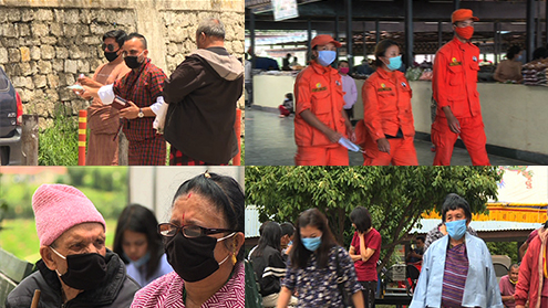 Volunteers making sure people use face masks properly in selected ...