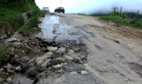 A road with more potholes than asphalt- Sherubling-Yueling in Trongsa ...